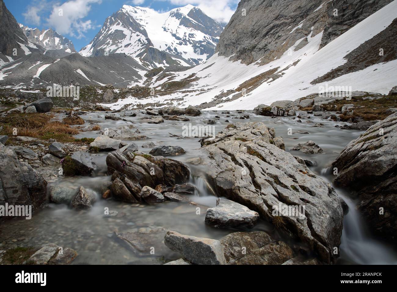 The lac des Vaches (Vaches lake) and the mountain stream Gliere,Vanoise ...