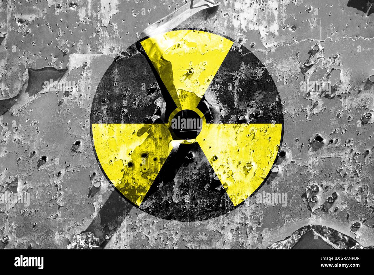 The sign of radiation is black and yellow against the background of ...