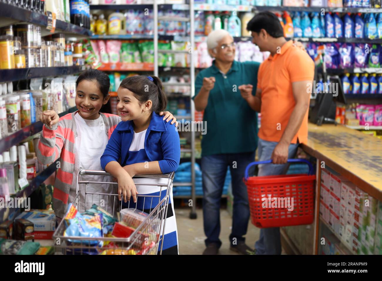 family enjoying purchasing in grocery store. Kids buying grocery in ...