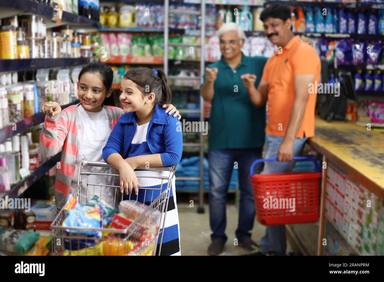 family enjoying purchasing in grocery store. Kids buying grocery in ...