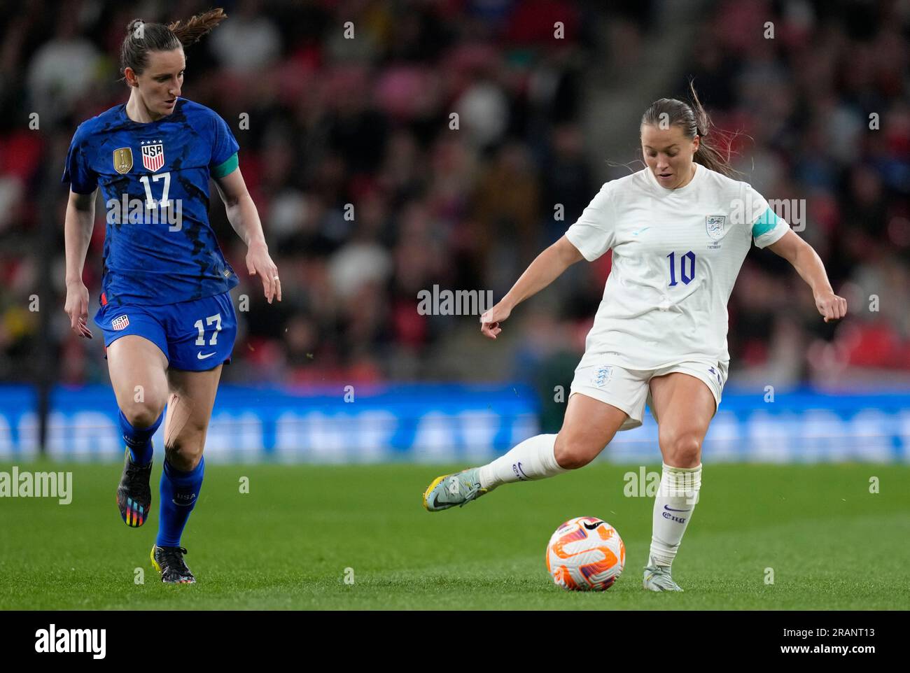 FILE - United States' Andi Sullivan, left, and England's Fran Kirby in ...