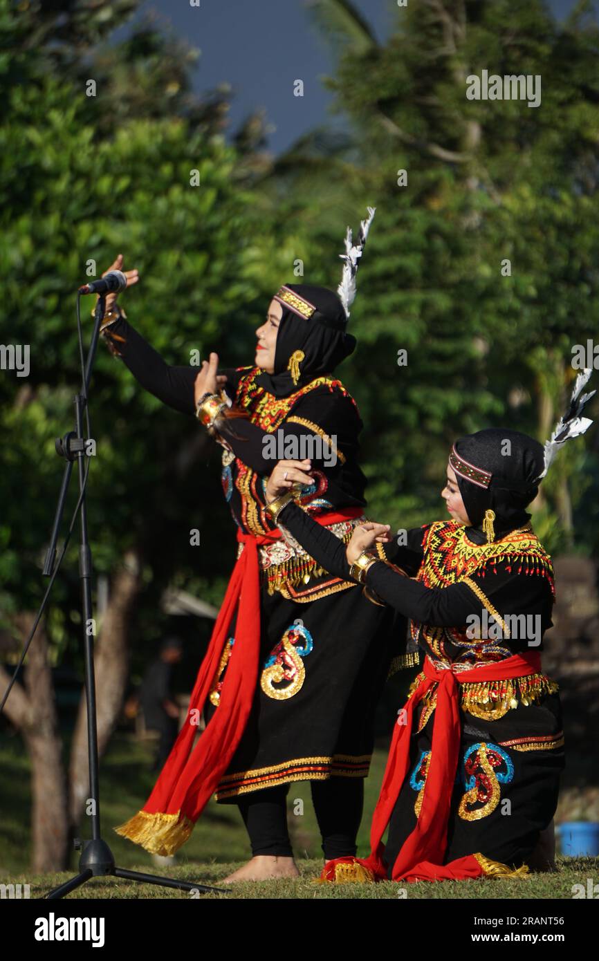 Indonesian performing burung nuri (parrot) dance. This dance comes from ...