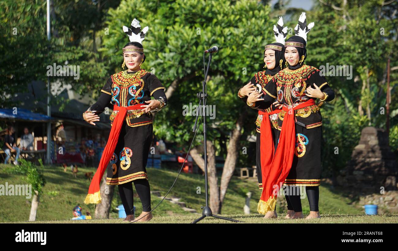 Indonesian performing burung nuri (parrot) dance. This dance comes from ...