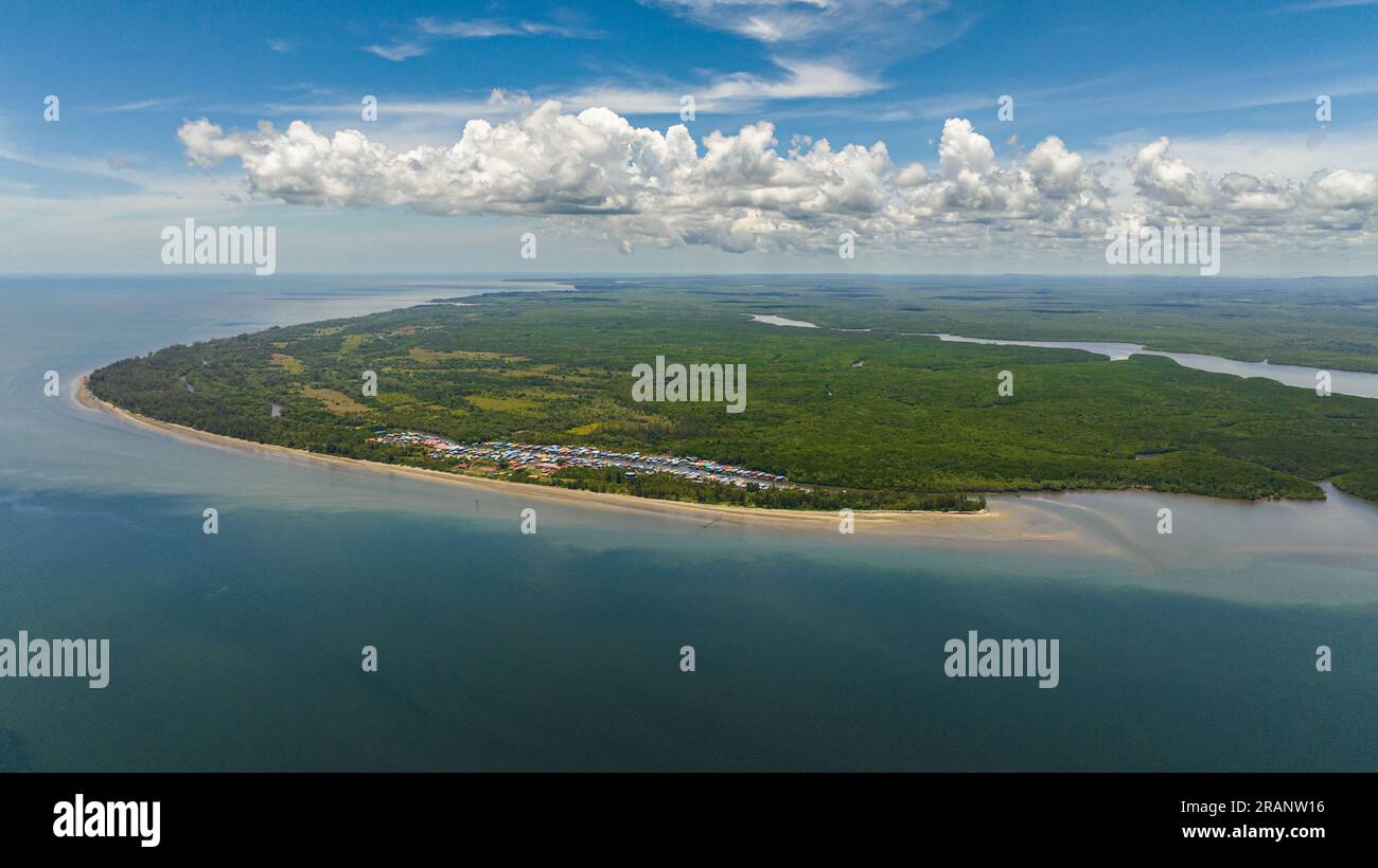 Aerial view of from the sea on the coast of the island of Borneo with ...