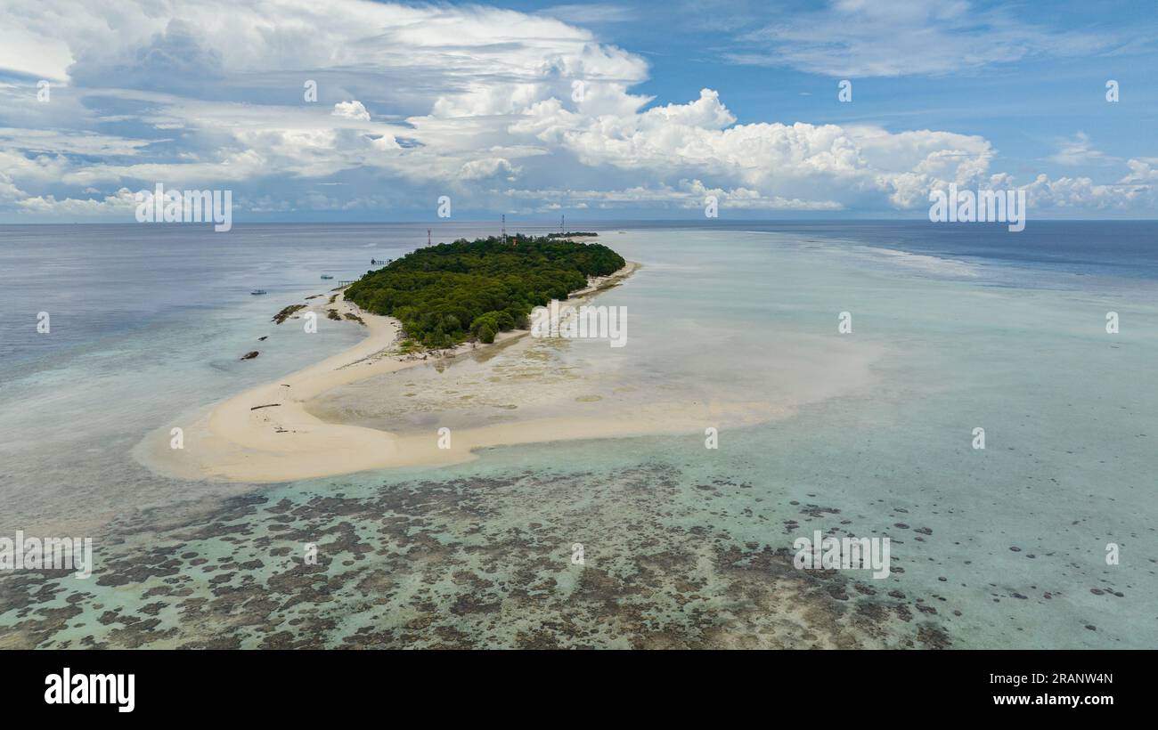 Aerial drone of tropical island Mataking with coral reef and atoll view ...