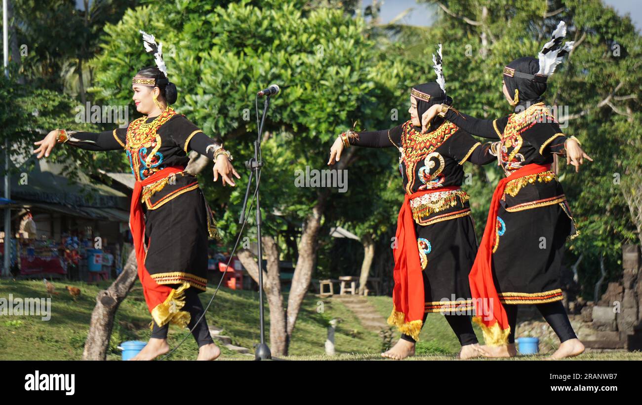 Indonesian performing burung nuri (parrot) dance. This dance comes from ...
