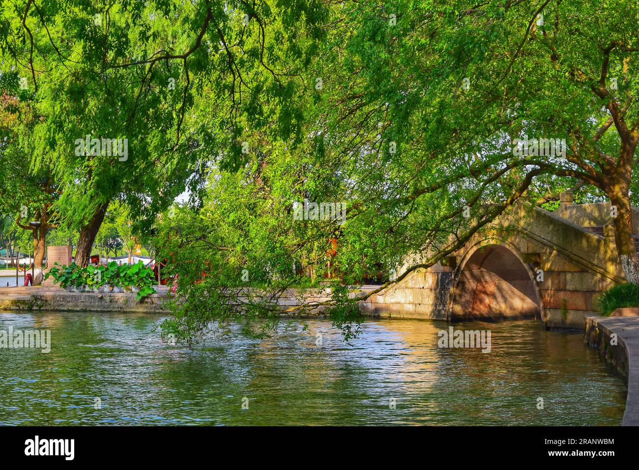 Explore the picturesque views of a tranquil river in China, captured ...