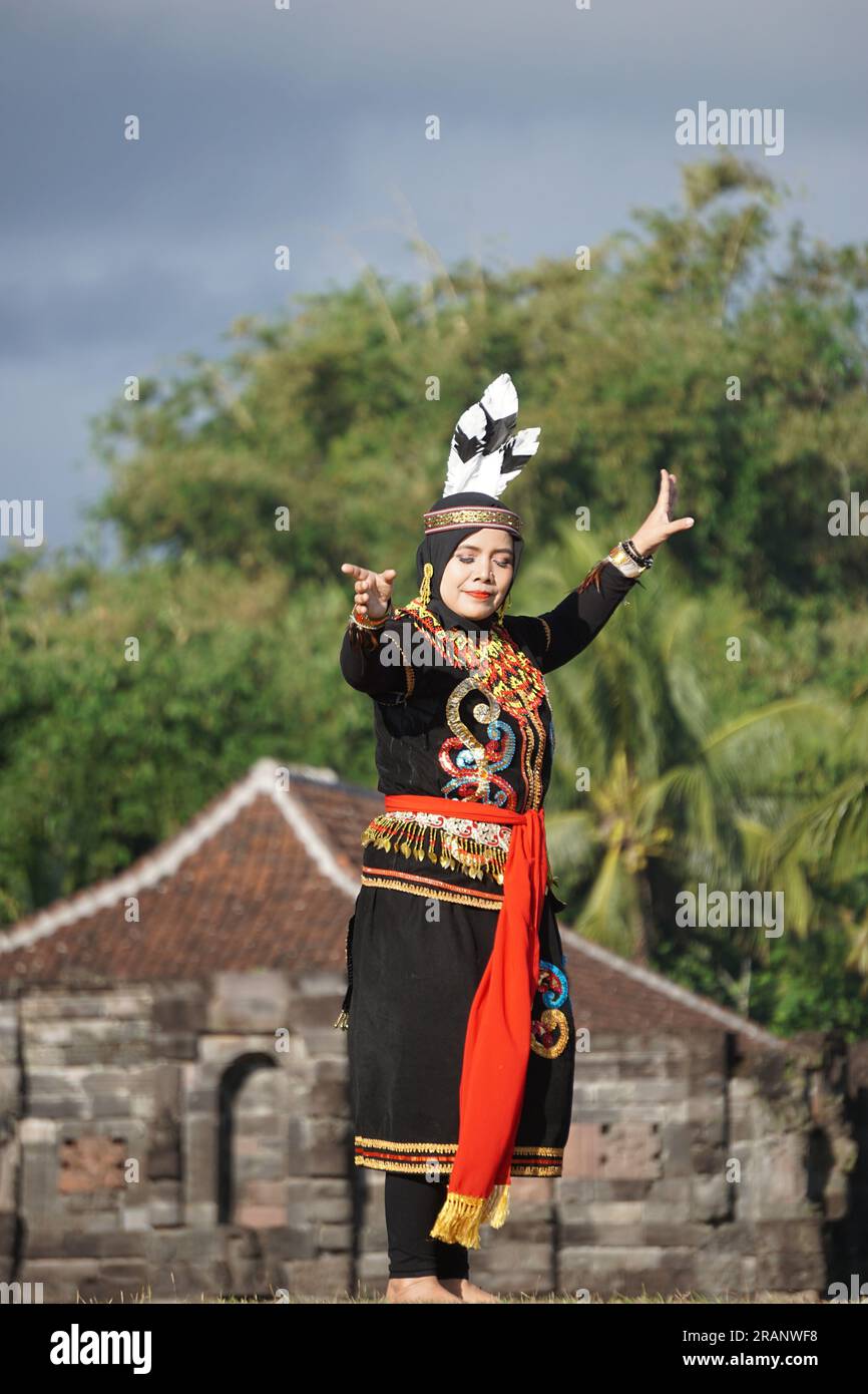 Indonesian performing burung nuri (parrot) dance. This dance comes from ...