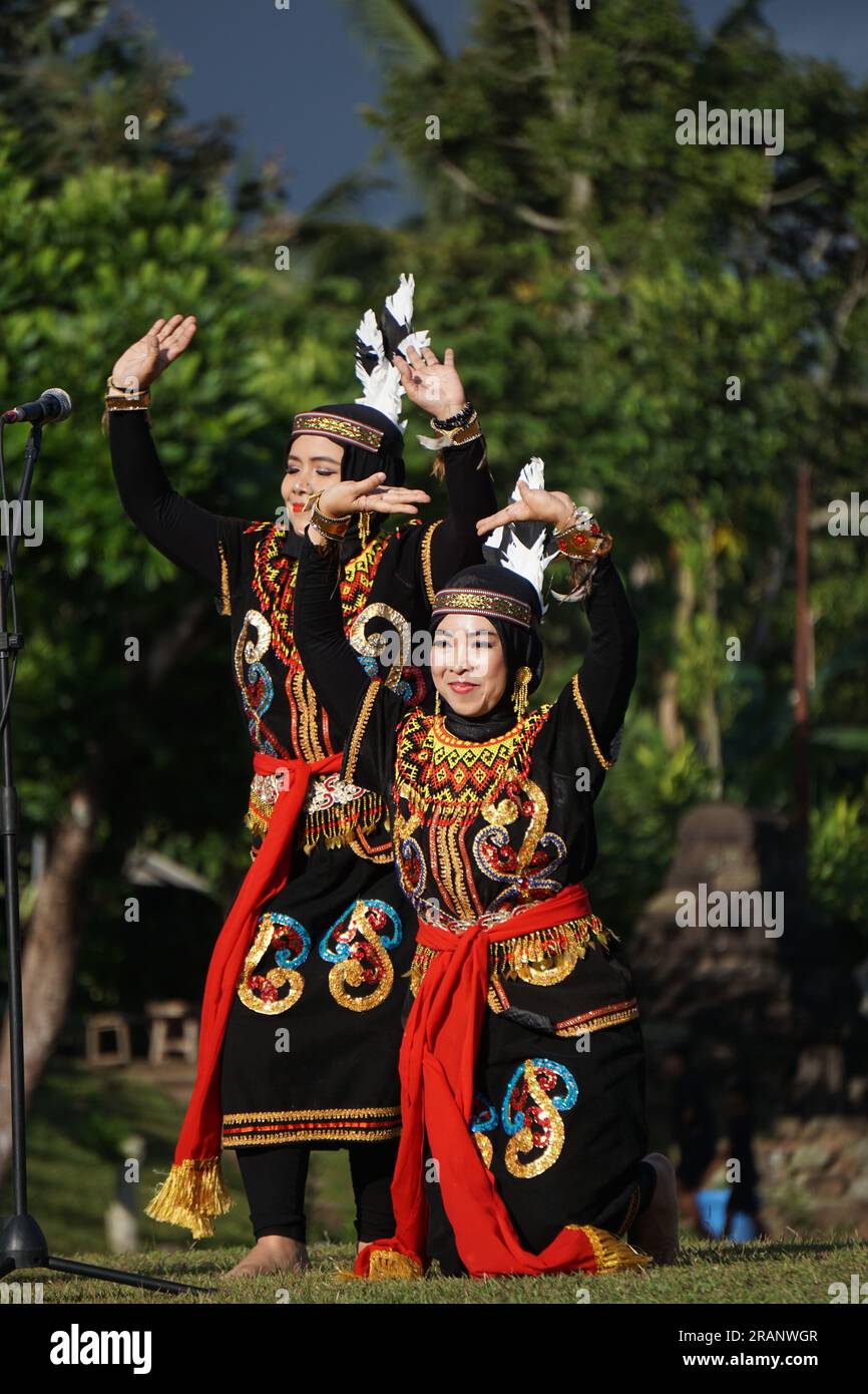 Indonesian performing burung nuri (parrot) dance. This dance comes from ...