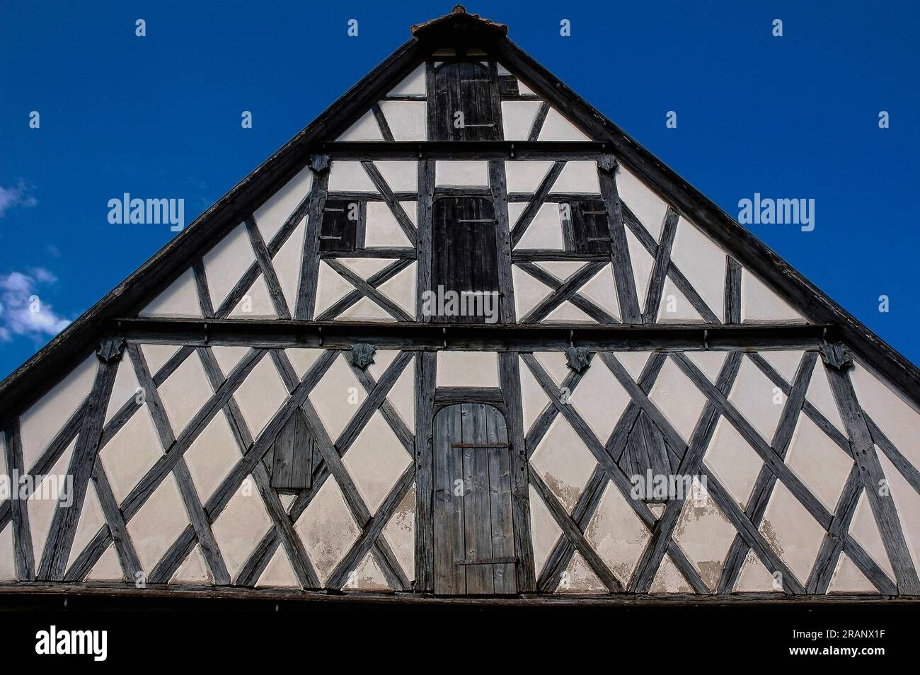 This fine timber-framed gable surmounts one of the ancient buildings in ...