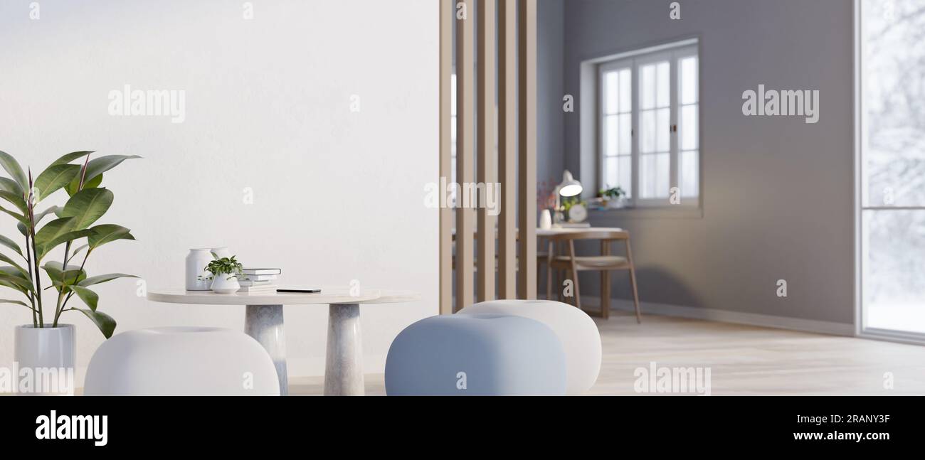 Interior design of a minimal white living room with poufs, table ...