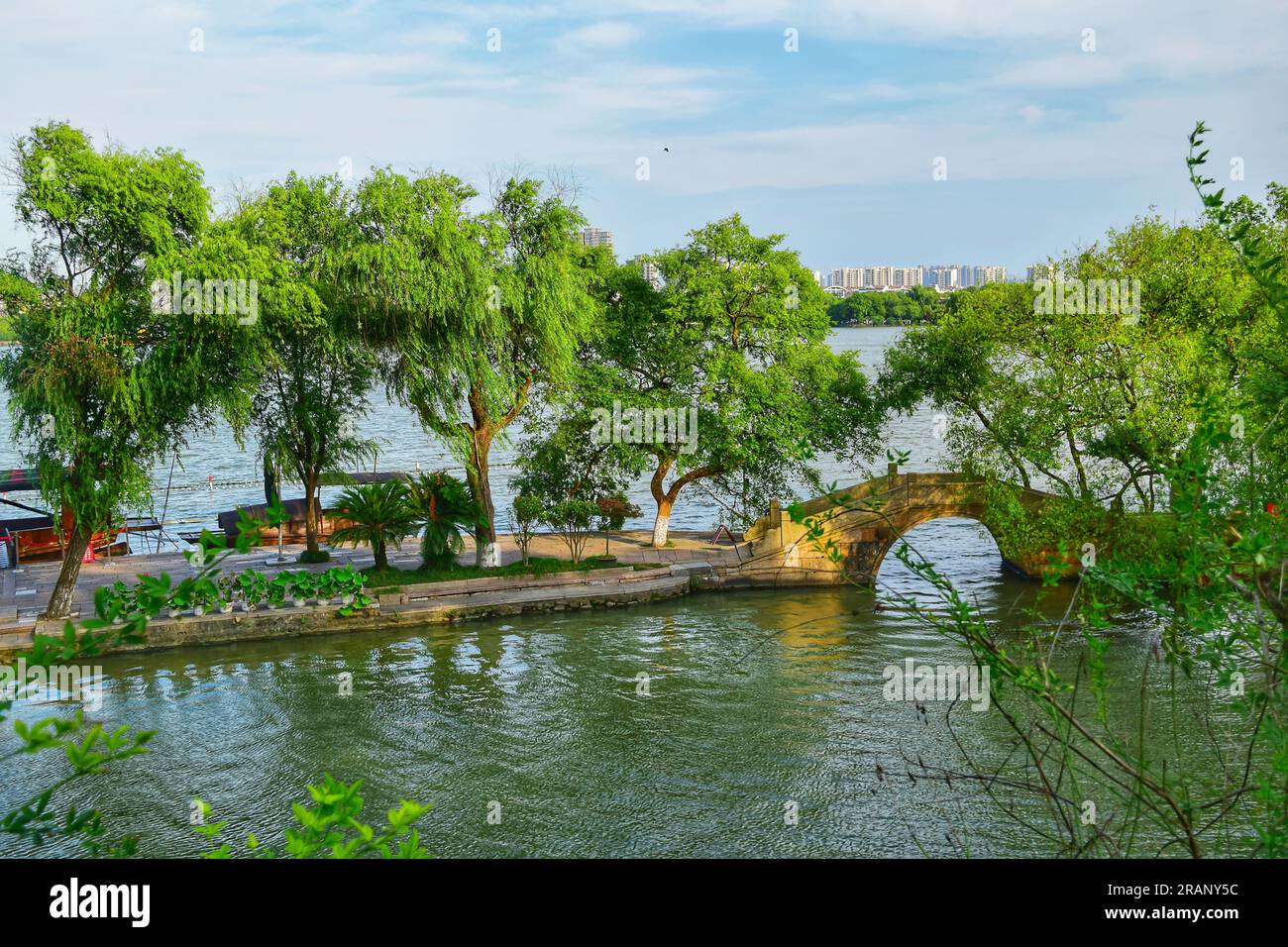 Explore the picturesque views of a tranquil river in China, captured ...