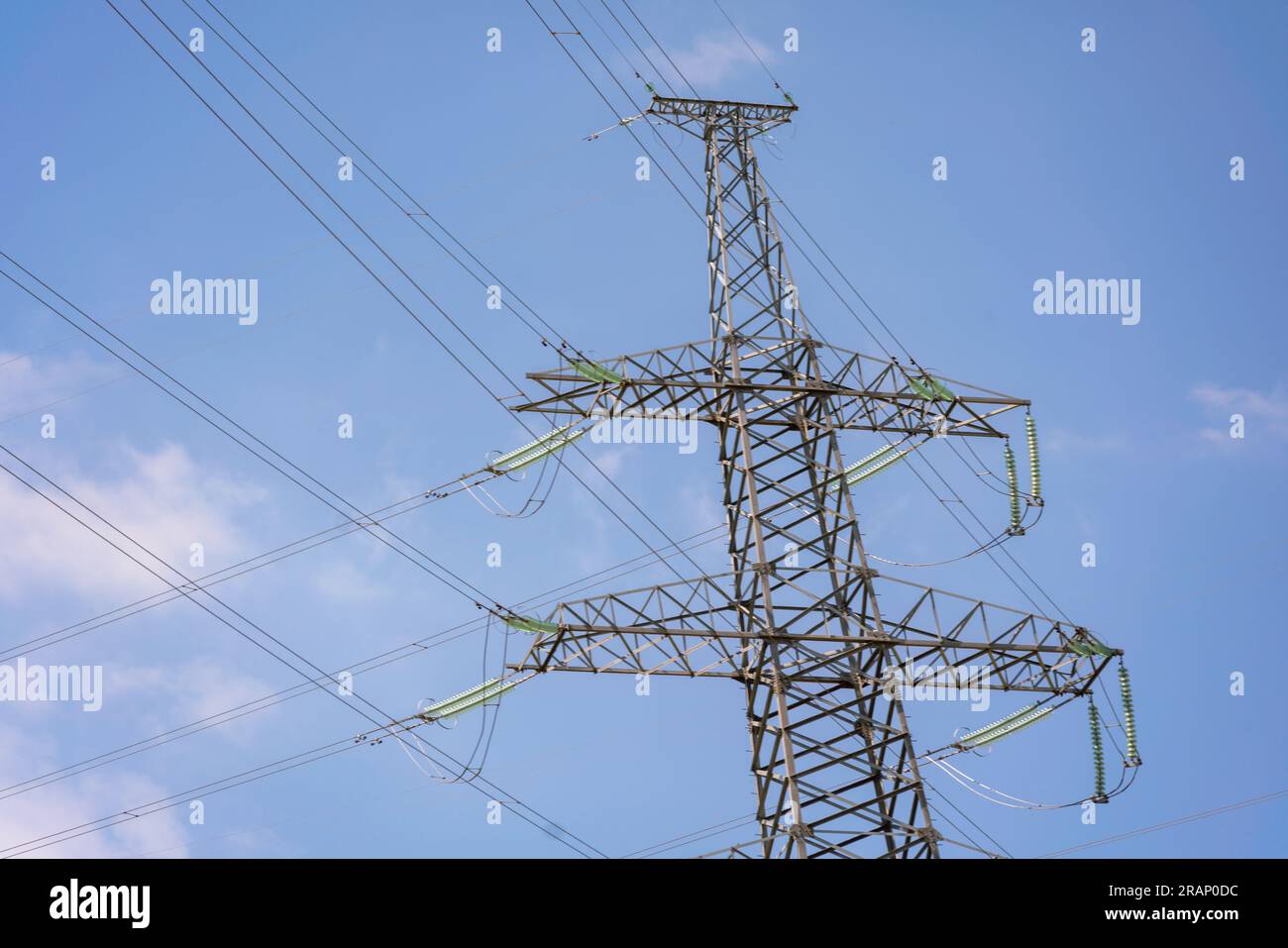 High voltage towers with sky background. Power line support with wires ...