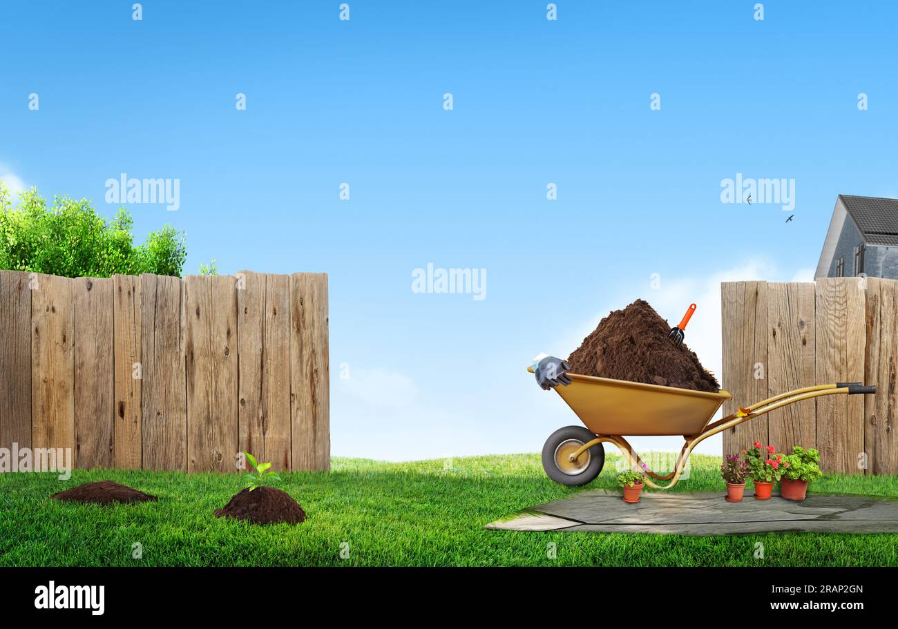 work in garden backyard lawn with tools, background with wooden fence ...