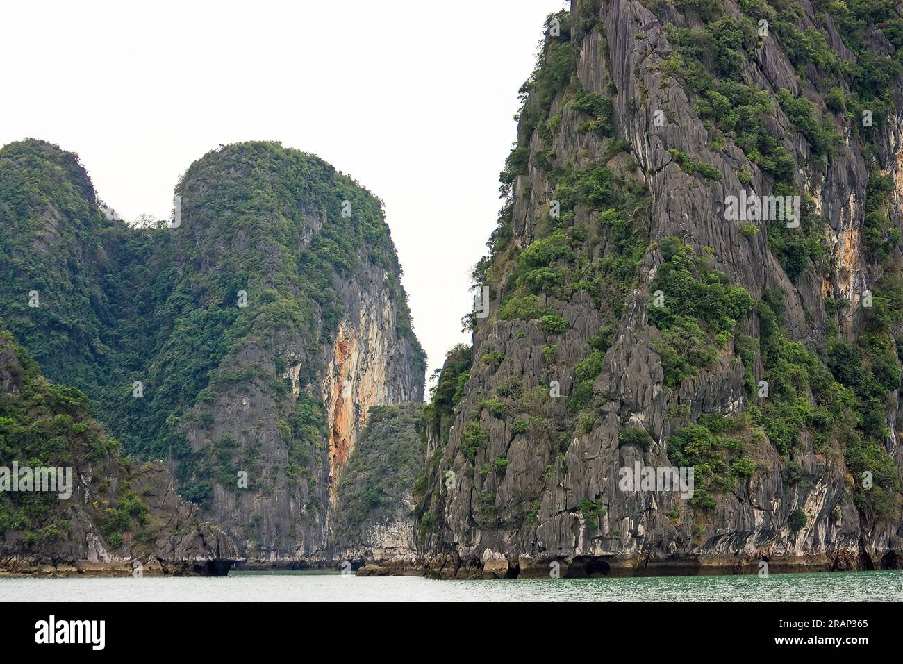 Ha Long Bay in misty weather Stock Photo - Alamy