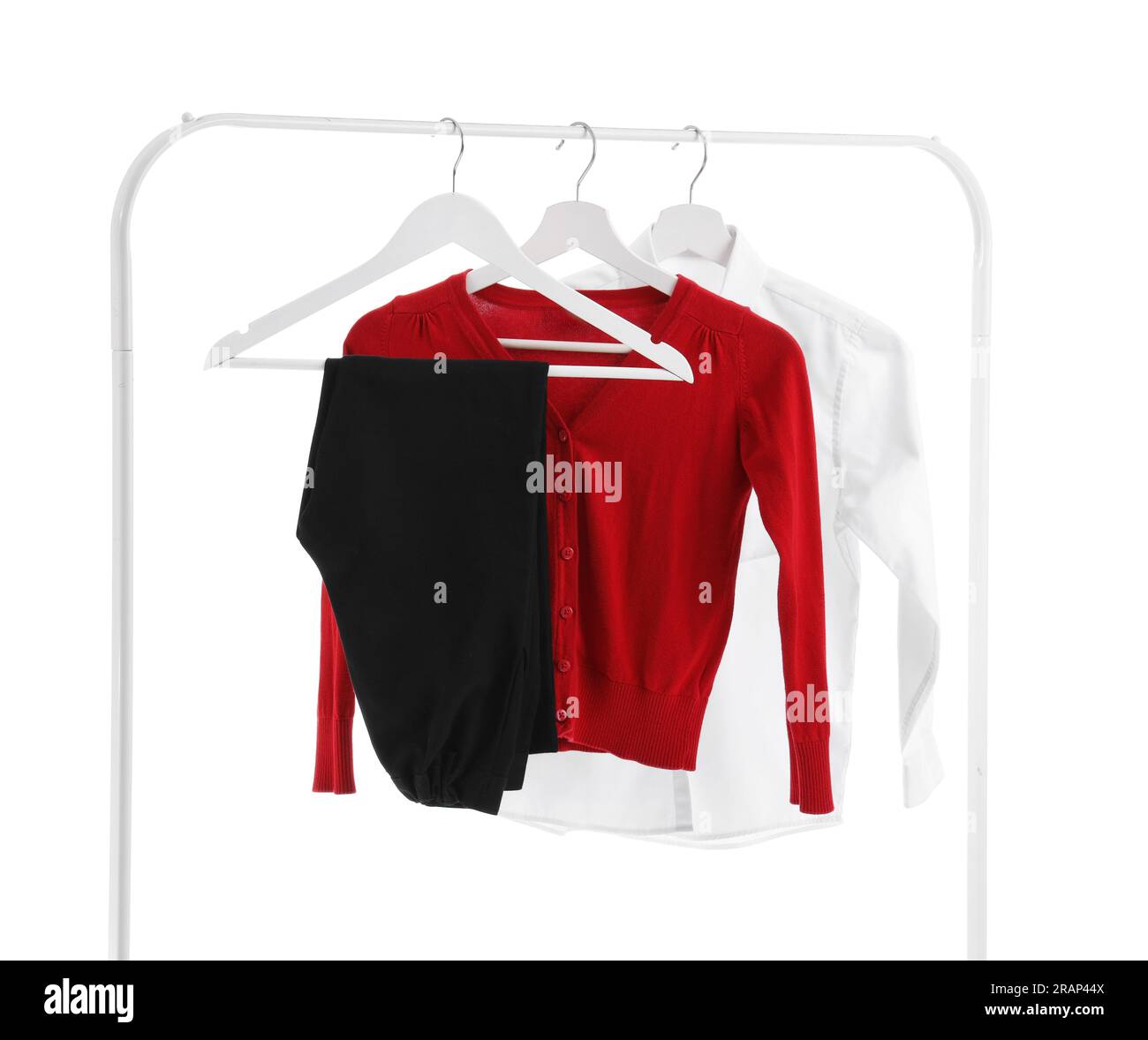 Rack with modern school uniform on white background Stock Photo - Alamy