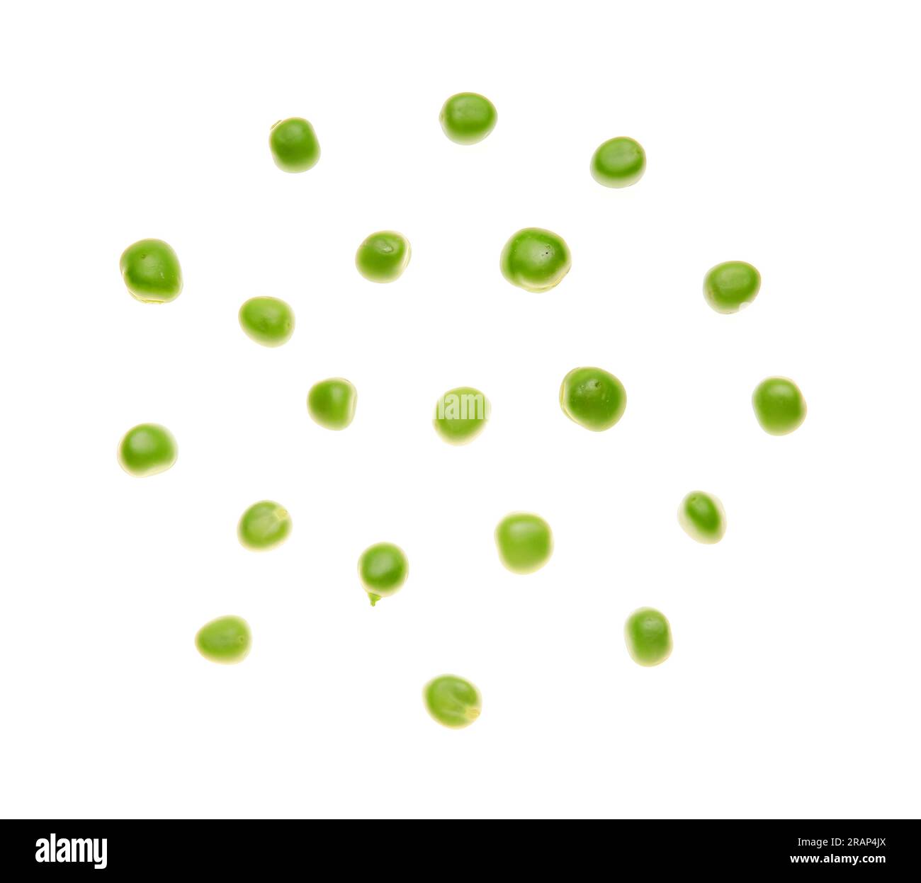 Flying green peas on white background Stock Photo - Alamy