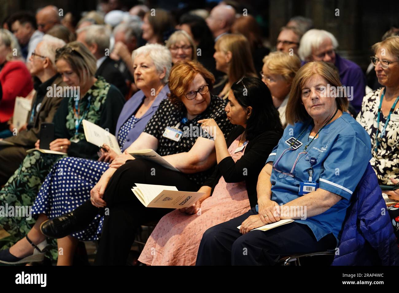 NHS staff members attend the NHS anniversary ceremony at Westminster ...
