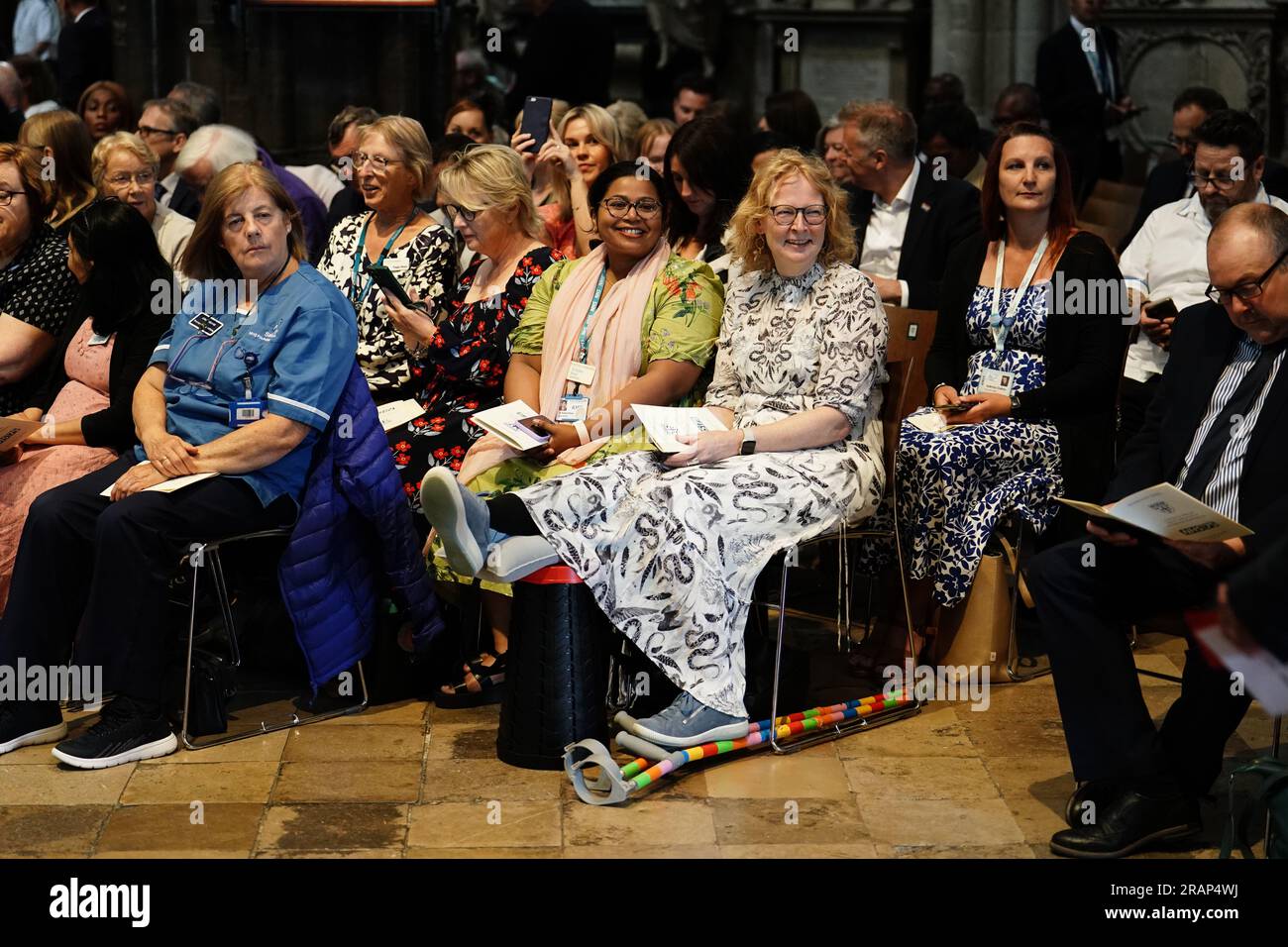 NHS staff members attend the NHS anniversary ceremony at Westminster ...