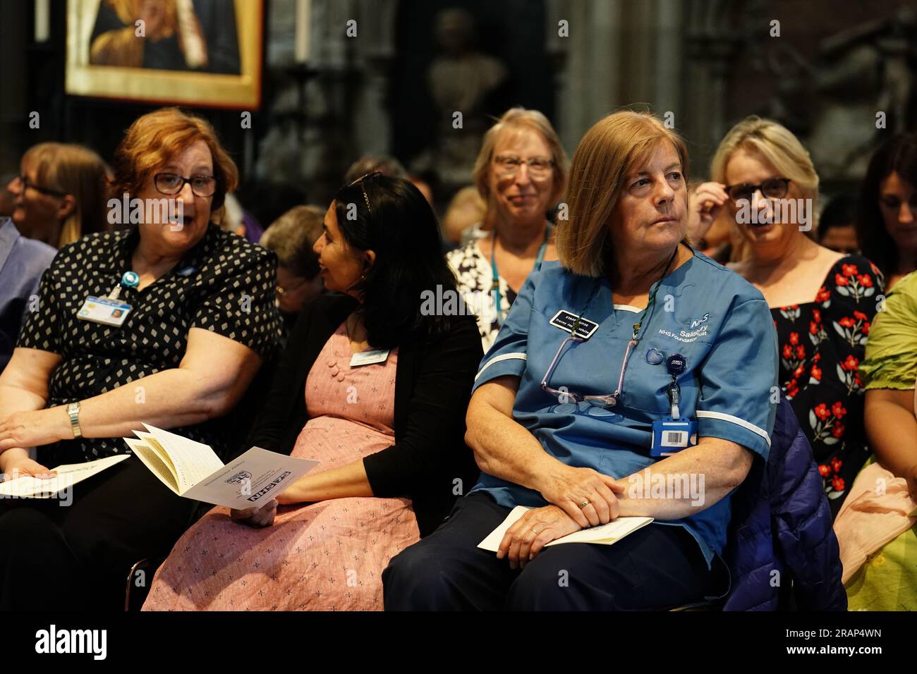 NHS staff members attend the NHS anniversary ceremony at Westminster ...