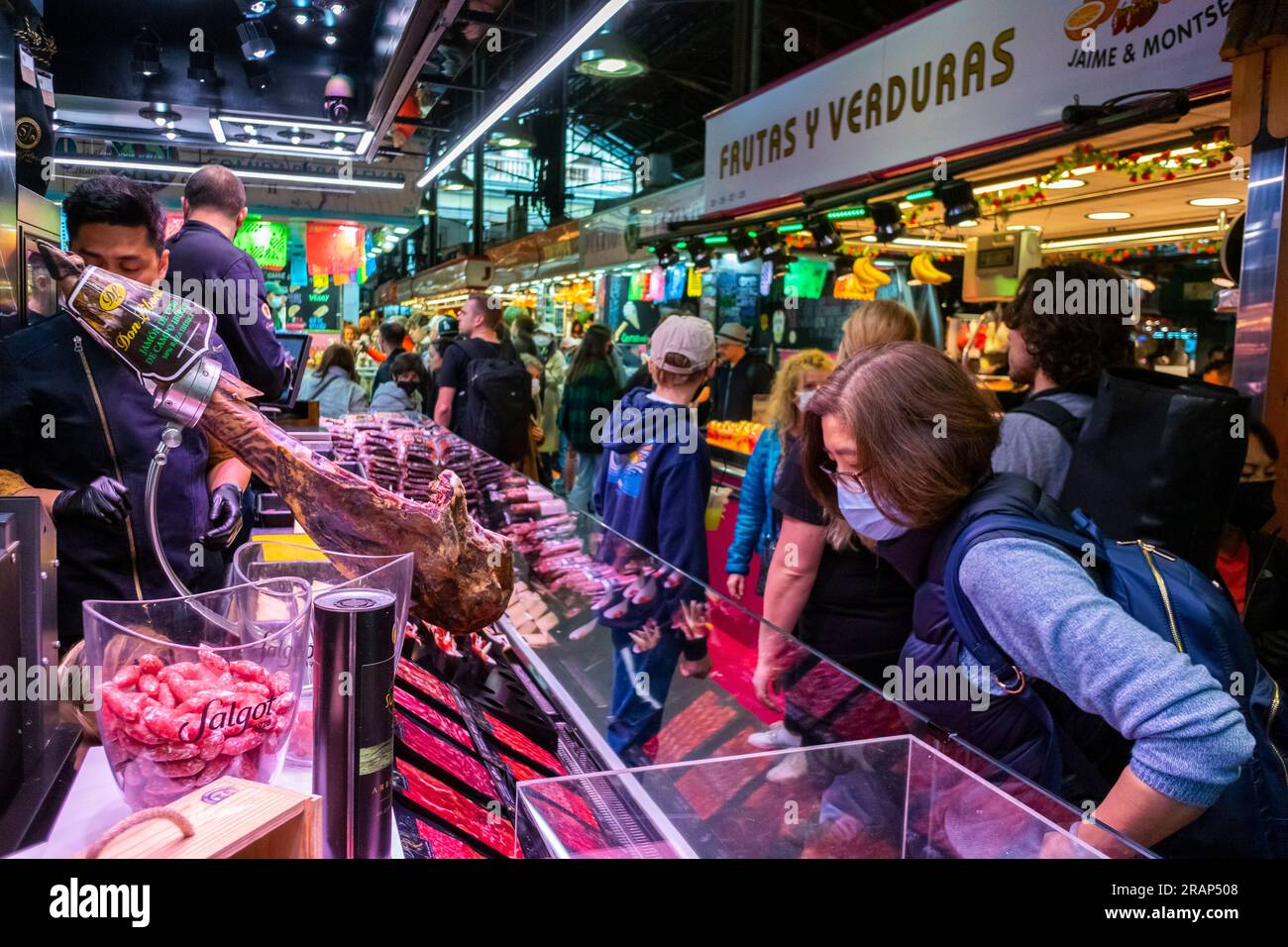 Barcelona, Spain, Large Crowd People, Woman shopping, Butcher Shop ...
