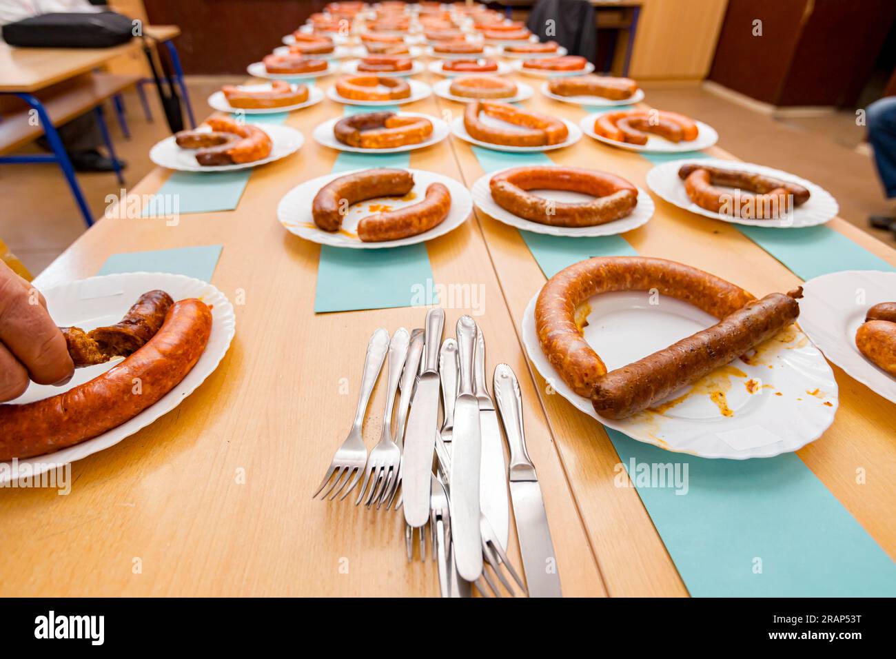 Traditional sausages are arranged for review at food contest. Judges ...