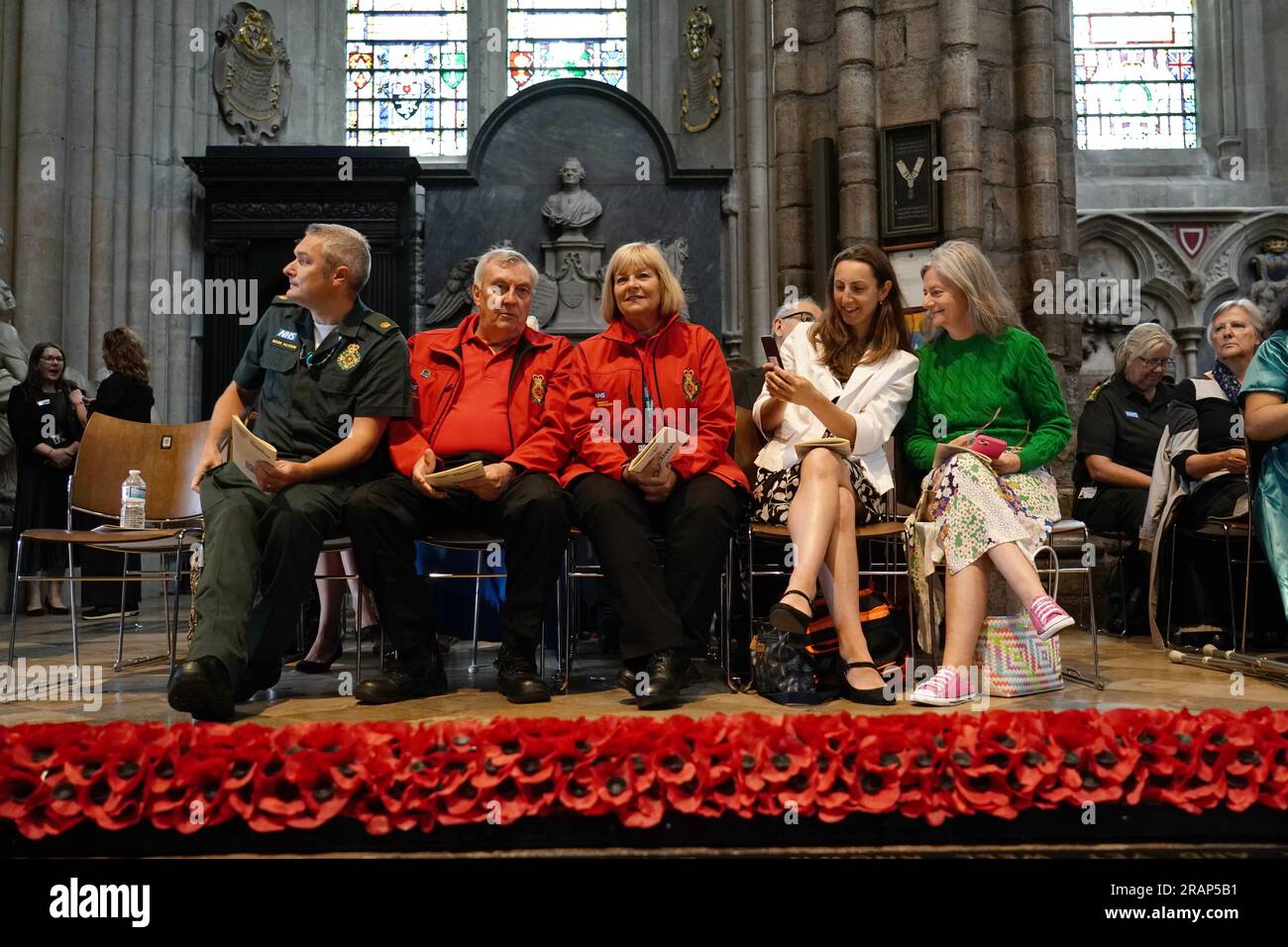 NHS staff members attend the NHS anniversary ceremony at Westminster ...