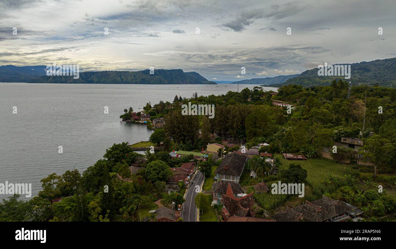 Lake Toba and Samosir Island. Tuk Tuk traditional village and tourist ...