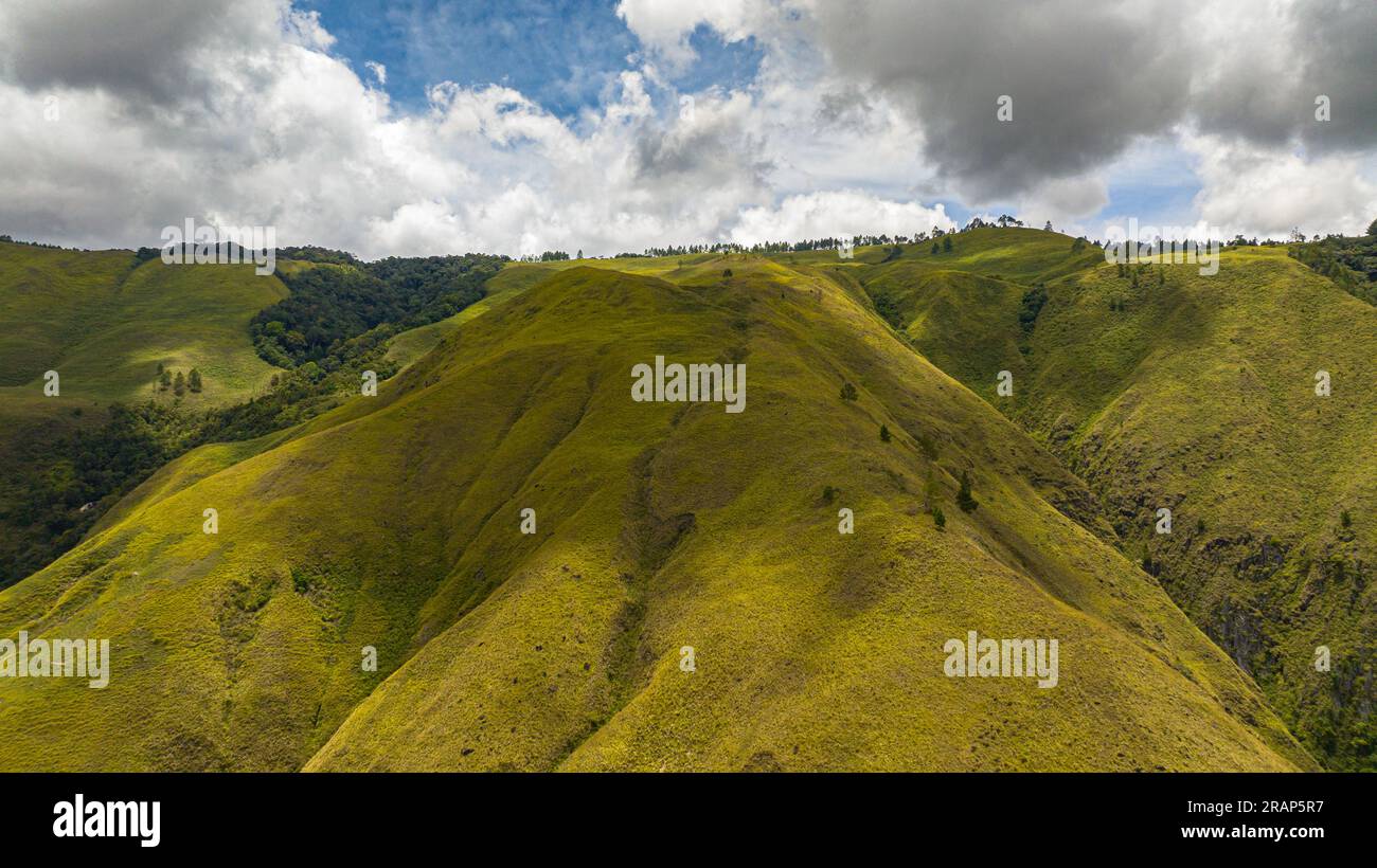 Aerial view of mountains and hills with forest in the tropics. Tropical ...