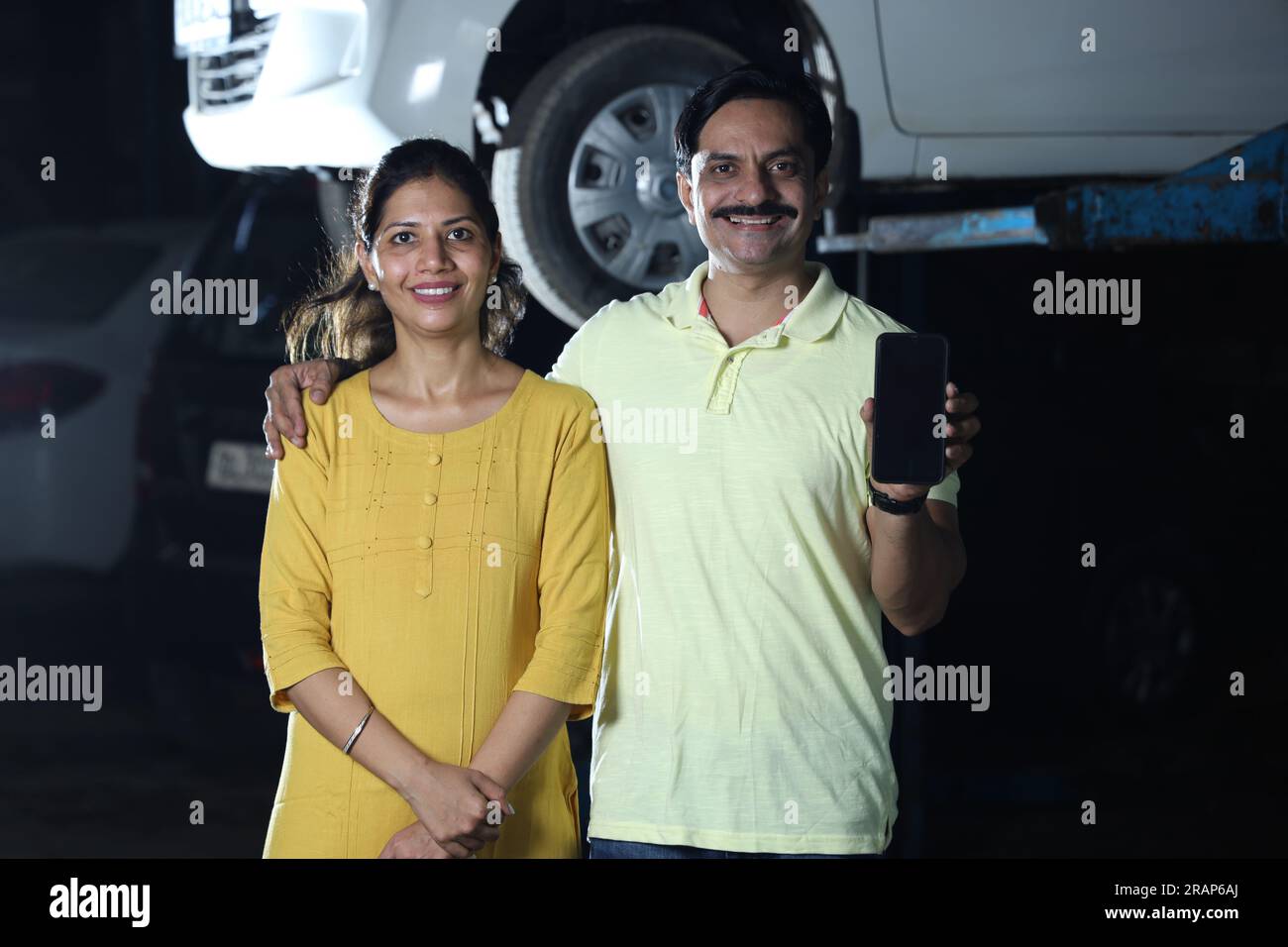 Indian happy customers showing thumbs up for repairing the car with ...