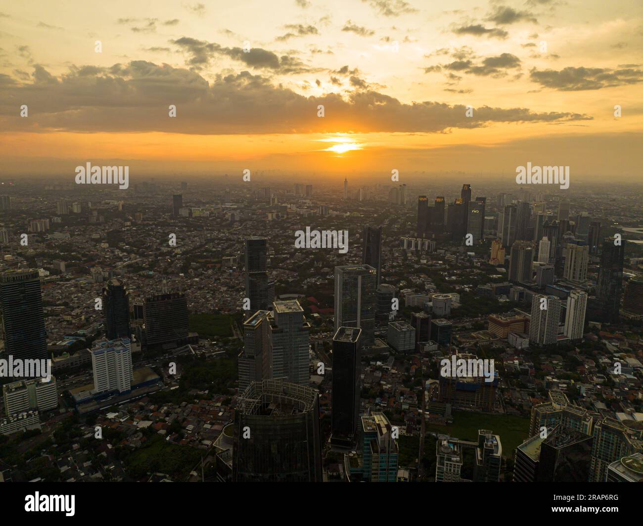 Aerial drone of Jakarta with modern buildings at sunset. Urban ...