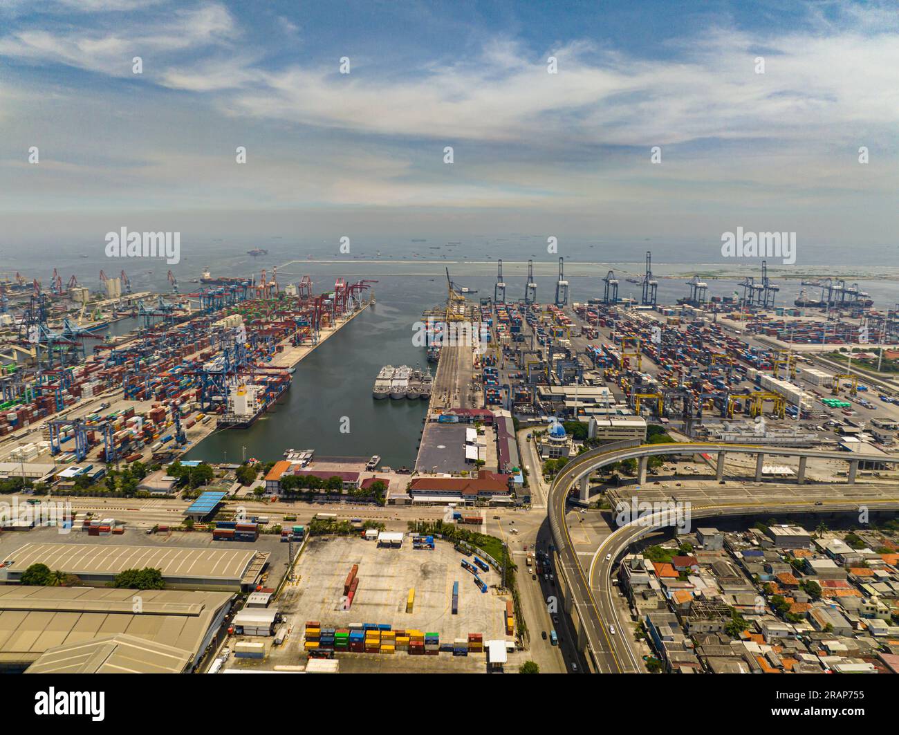 Aerial drone ofsea cargo port with containers and cranes. Tanjung Priok ...