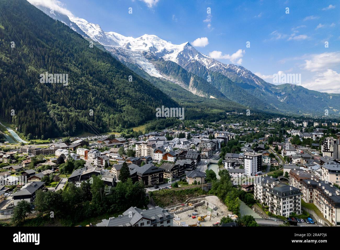 Aerial of tourist destination in French Alps Chamonix village with the ...