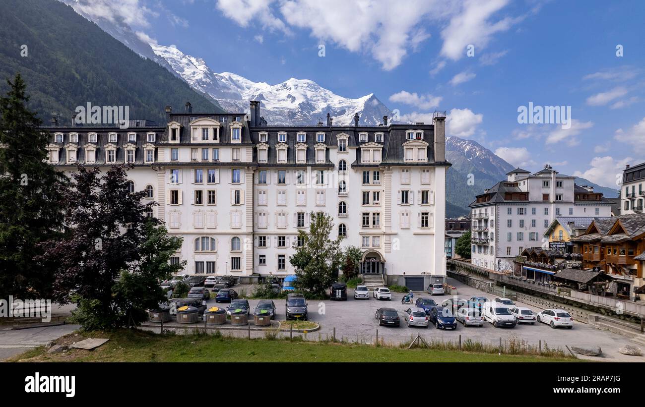 Aerial of hotel facade in touristic French Alps village with the Mont ...