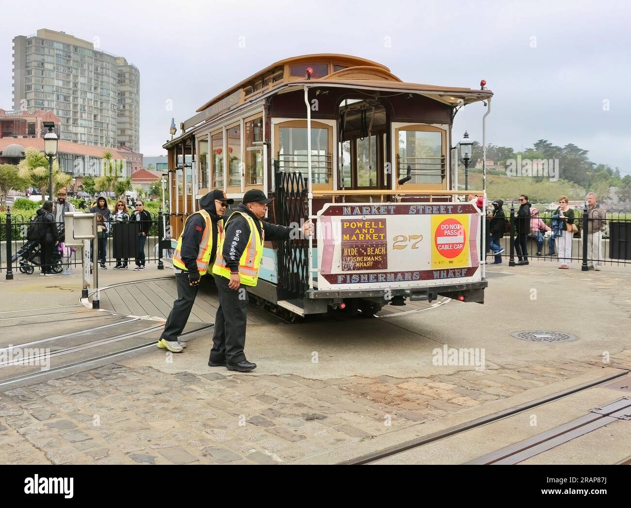 Antique cable car being pushed round at the Powell/Hyde Cable Car ...