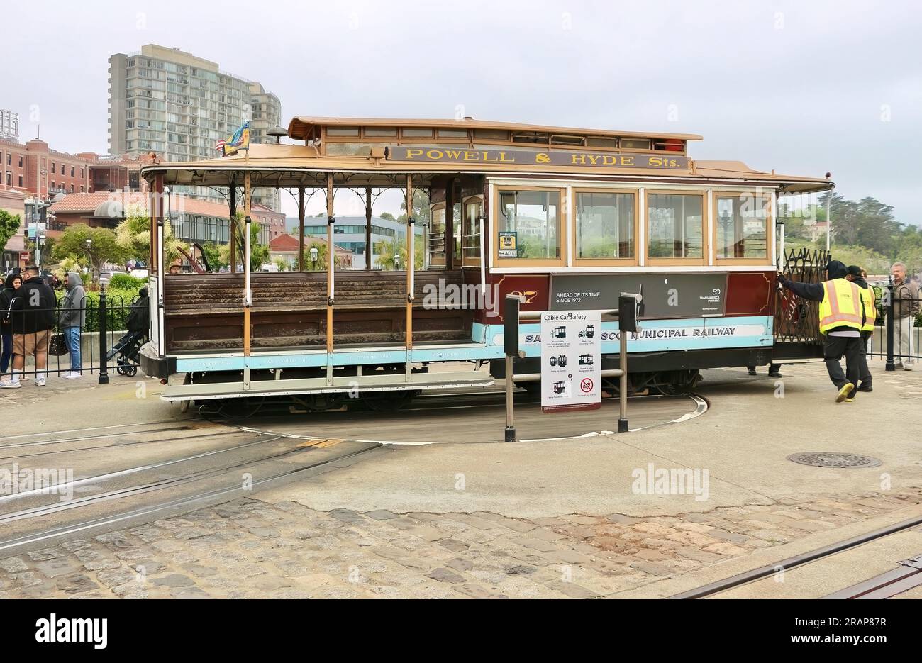 Antique cable car being pushed round at the Powell/Hyde Cable Car ...