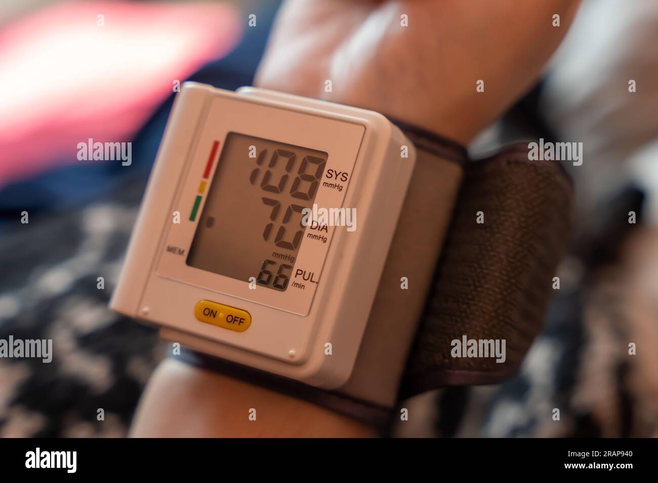 Blood pressure monitor on hand showing normal blood pressure Stock ...