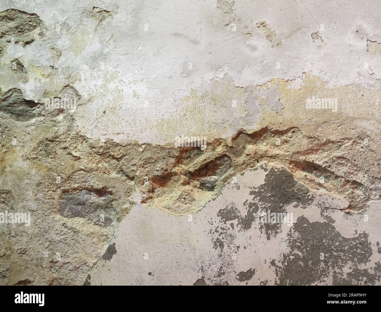 damage caused by dampness and moisture on a wall Stock Photo - Alamy