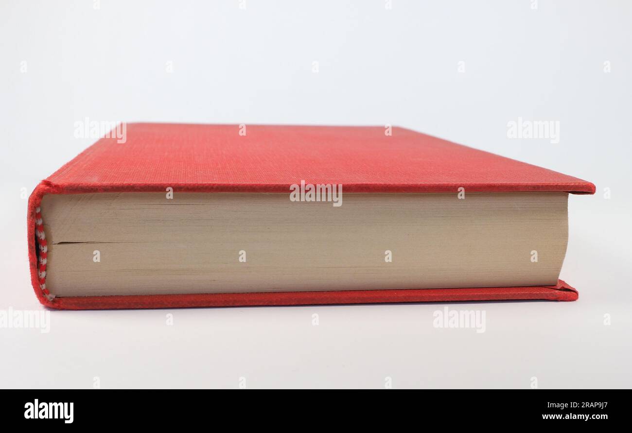 closed red book over off white background with copy space Stock Photo ...