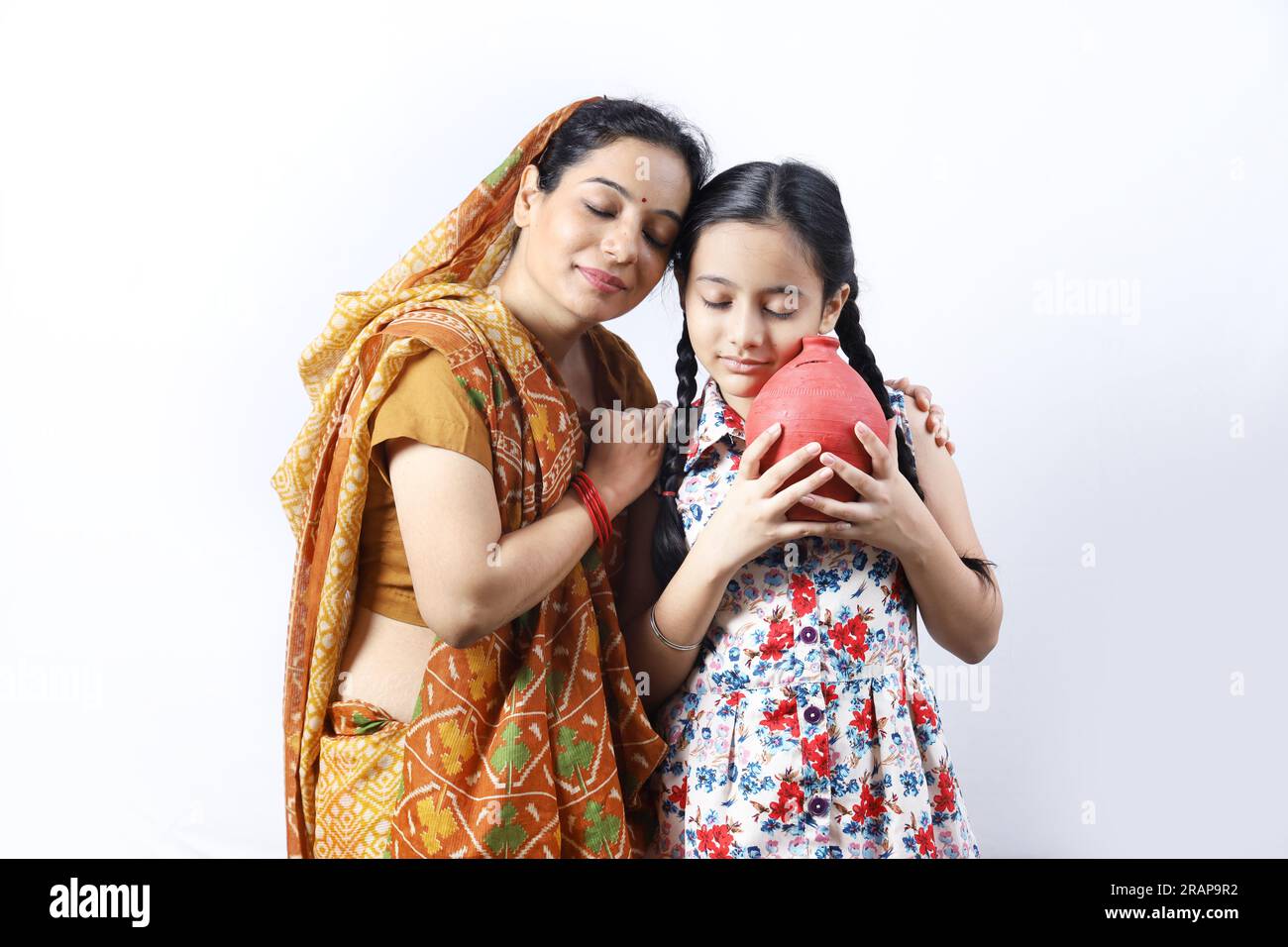 Happy rural Indian villager family of women saving money for future in ...