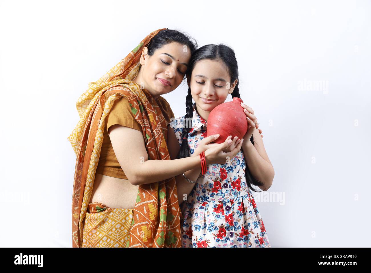Happy rural Indian villager family of women saving money for future in ...