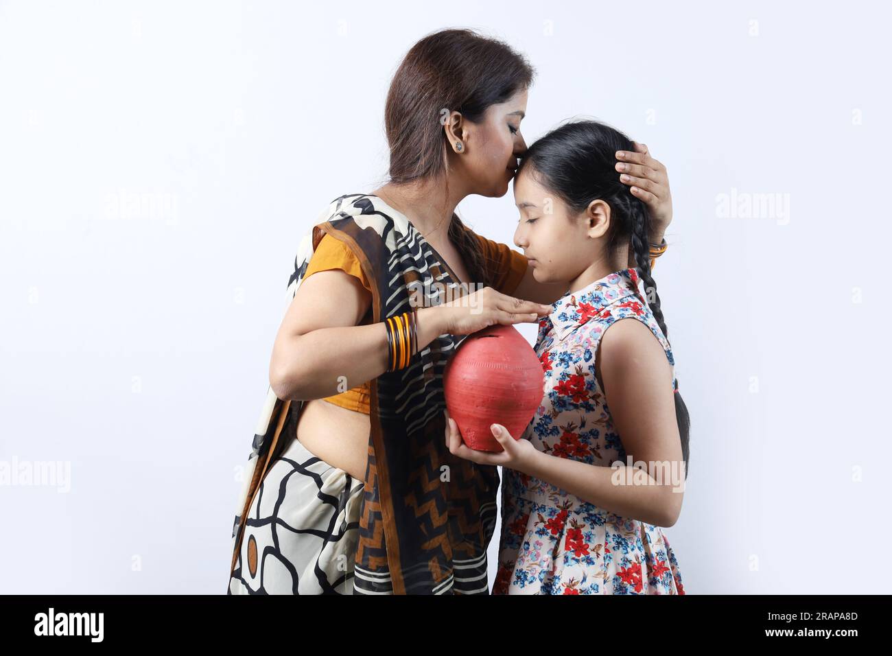 Happy rural Indian villager family of women saving money for future in ...
