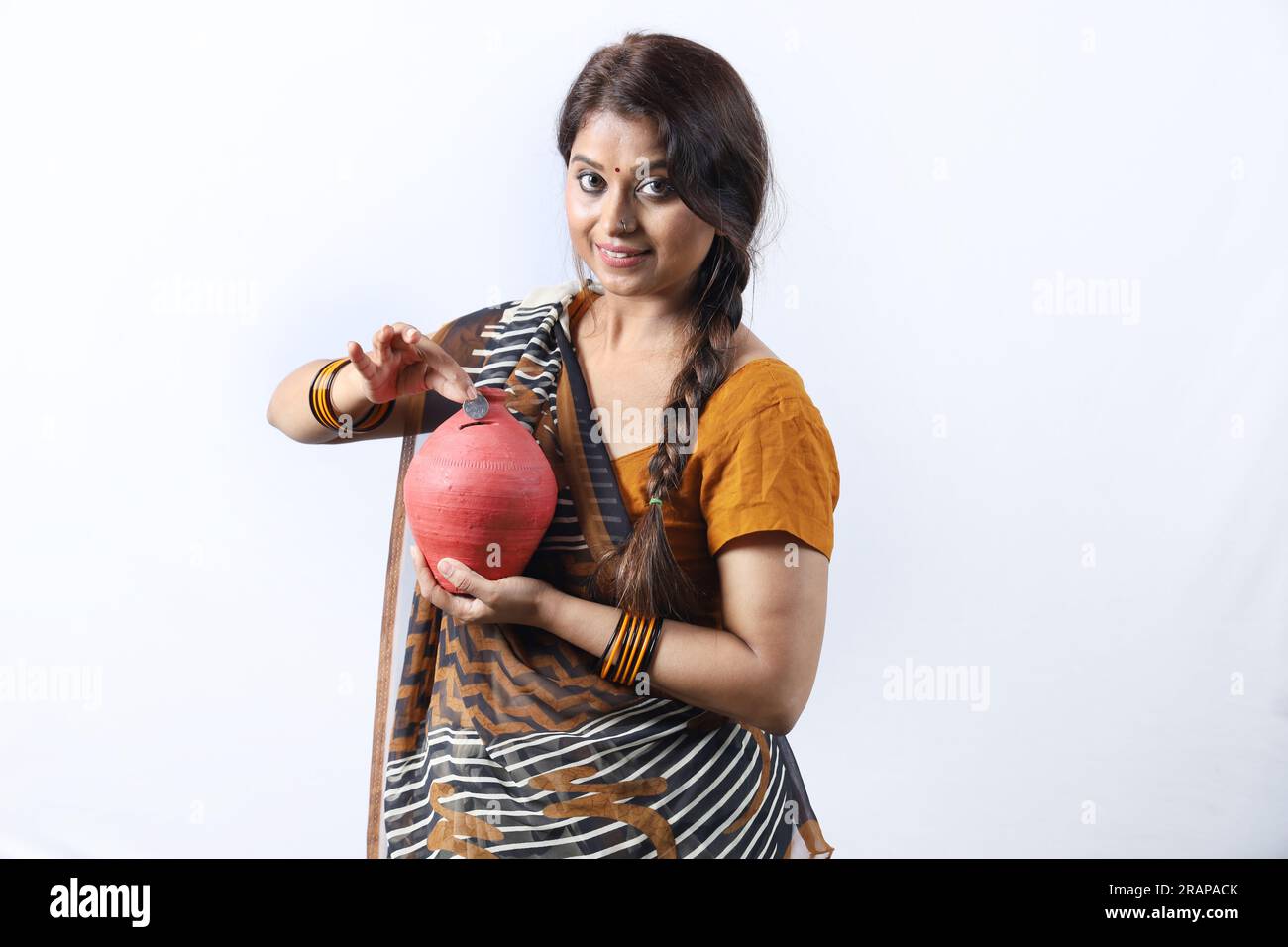 Rural indian woman in saree is a house wife hi-res stock photography ...