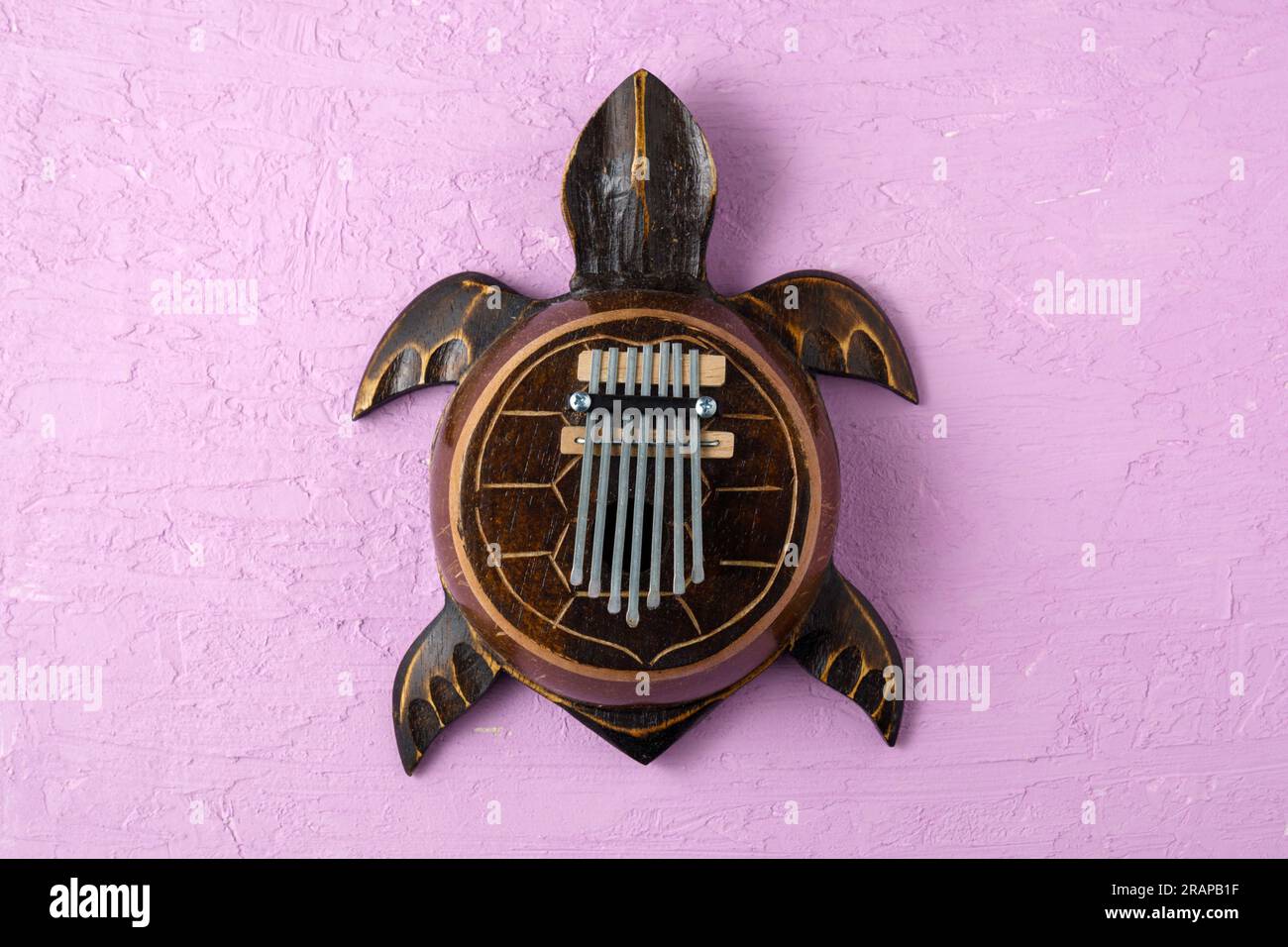 Kalimba turtle .Traditional Kalimba made from wooden board with metal ...