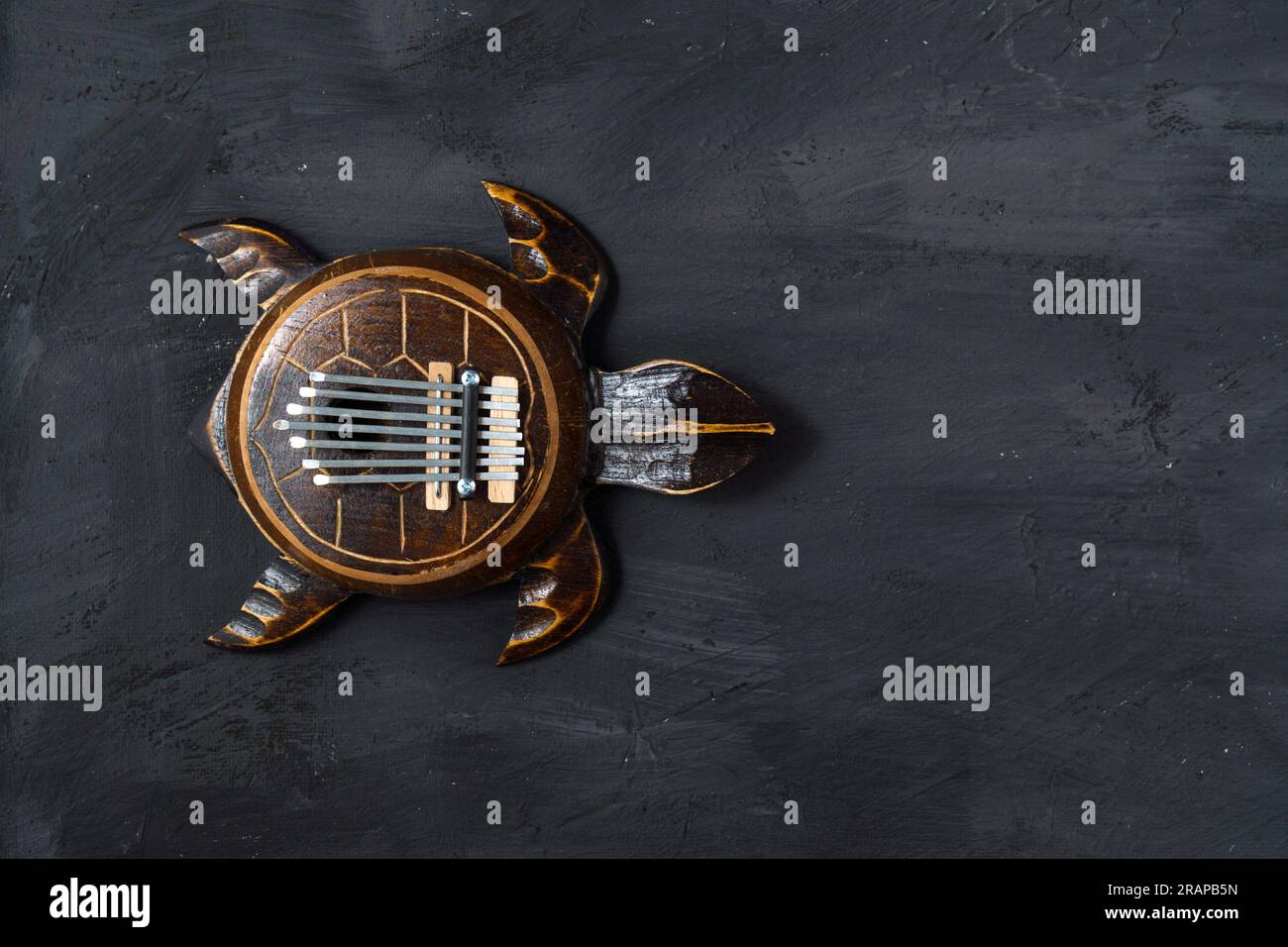 Kalimba turtle .Traditional Kalimba made from wooden board with metal ...