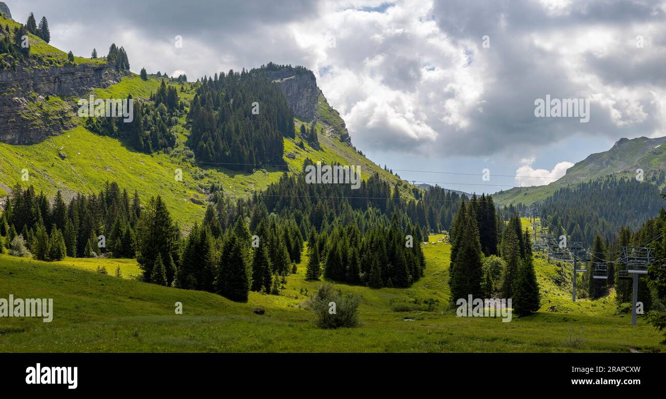 Mountain range around Montriond lake in French Alps near Les Gets with ...
