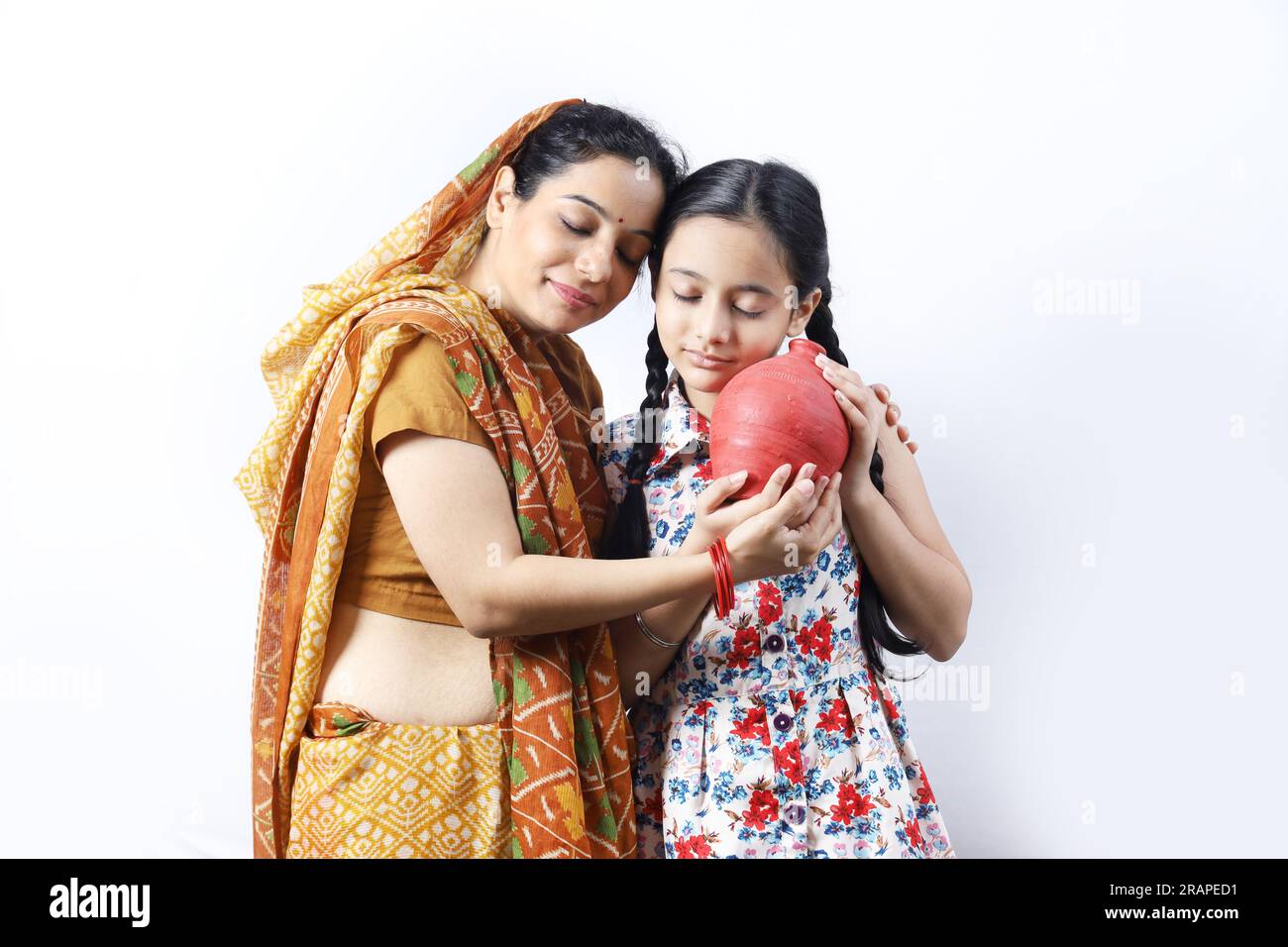 Happy rural Indian villager family of women saving money for future in ...