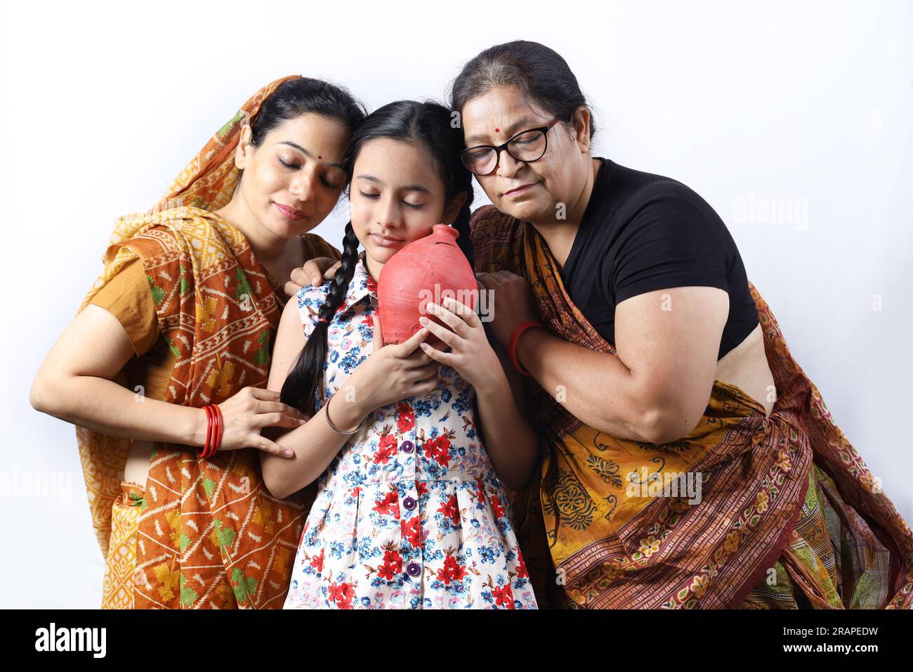 Happy rural Indian villager family of women saving money for future in ...