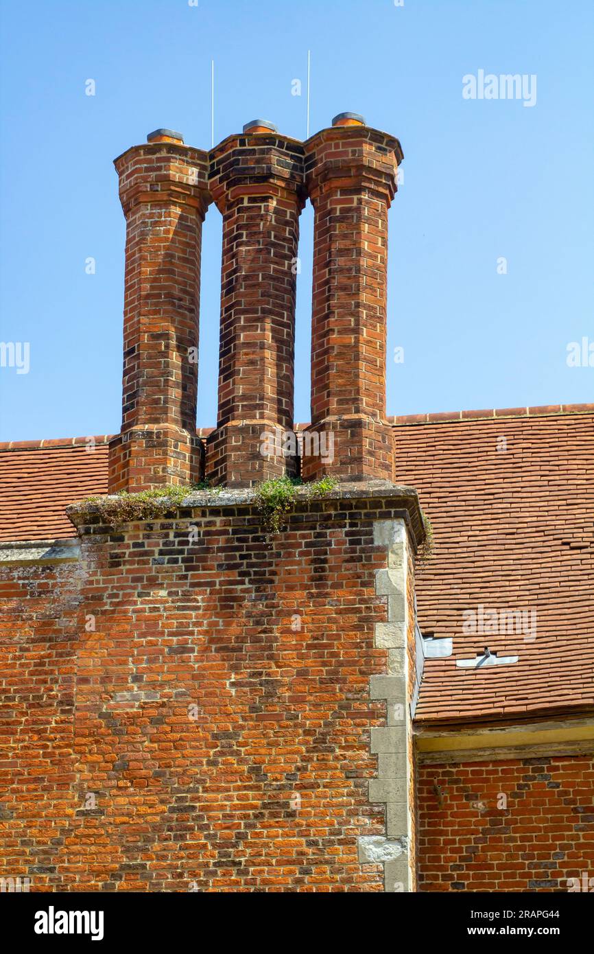 Restored chimney stacks on the roof of a 500 year old Tudor mansion ...