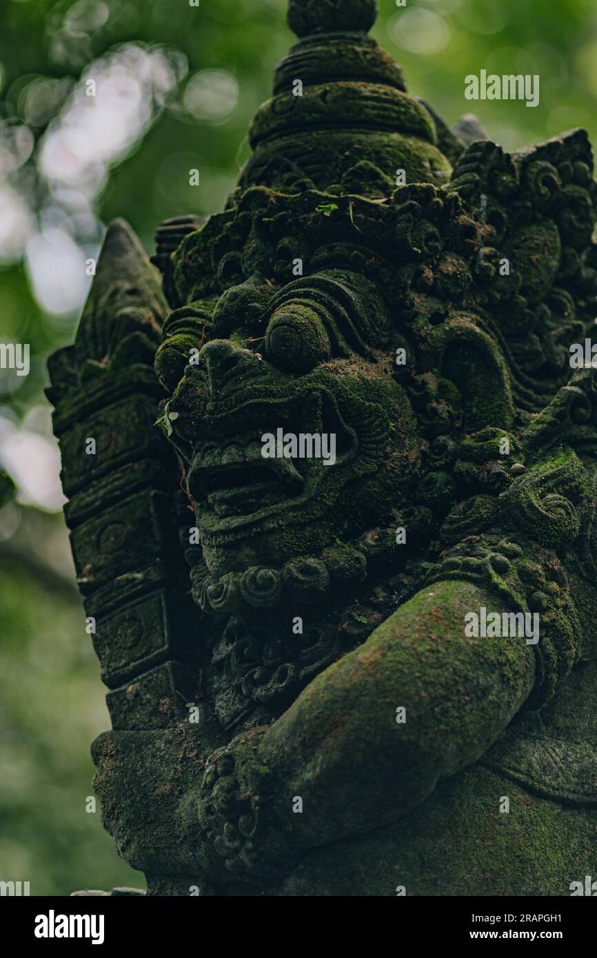 Stone sculpture in sacred monkey forest. Balinese architecture carved ...